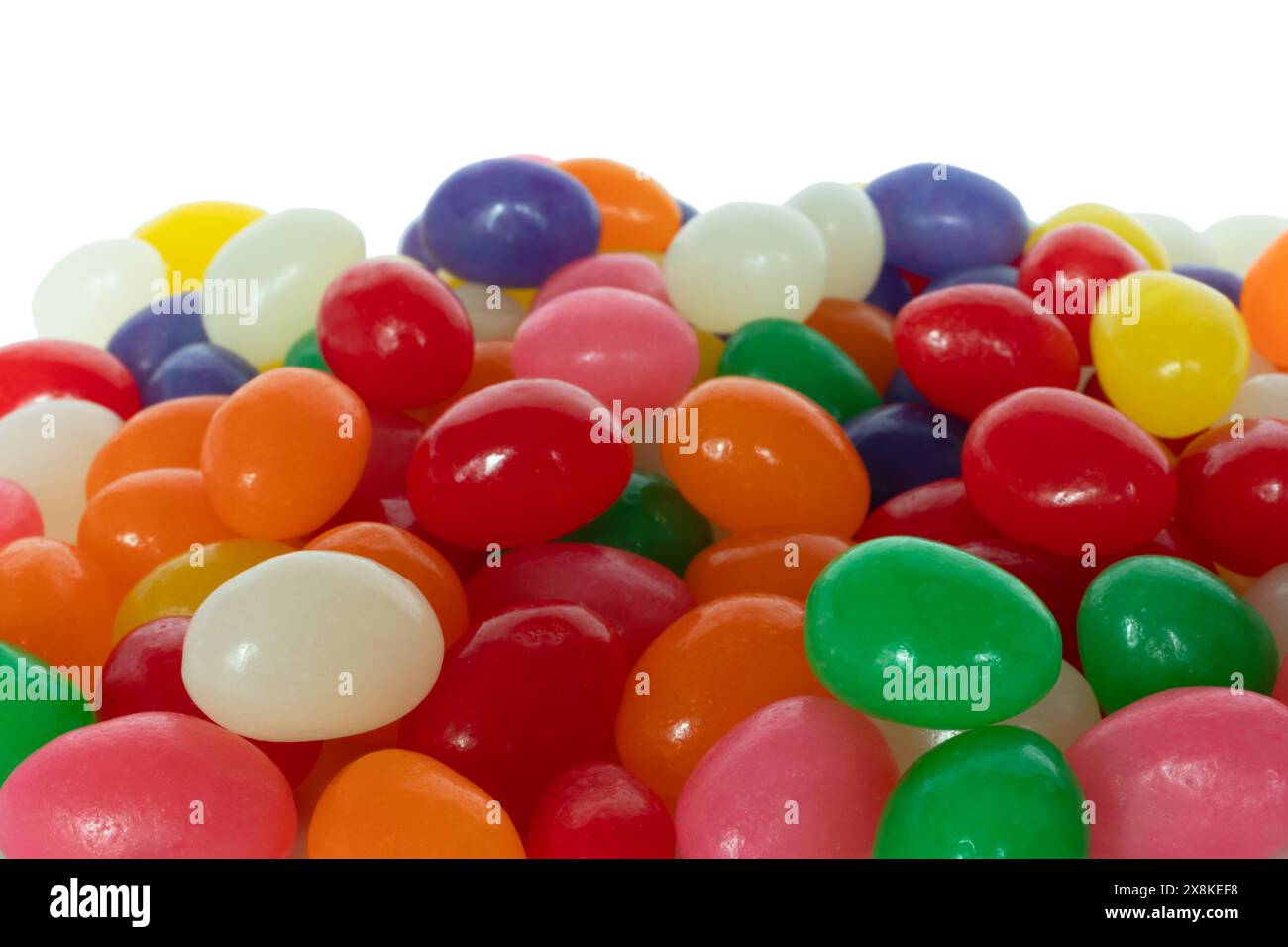 Colorful pile of jelly beans with red, orange, yellow, green, purple ...