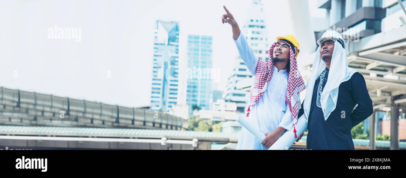 Banner arab engineer construction project together hold blueprint ...