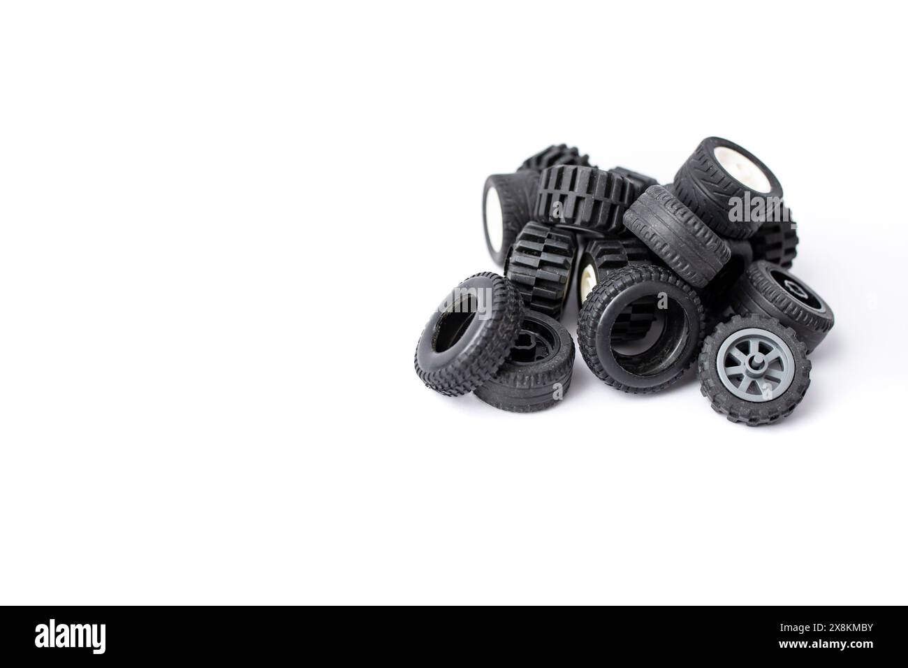 Different patterned wheels and rubber from child toys, stacked and ...