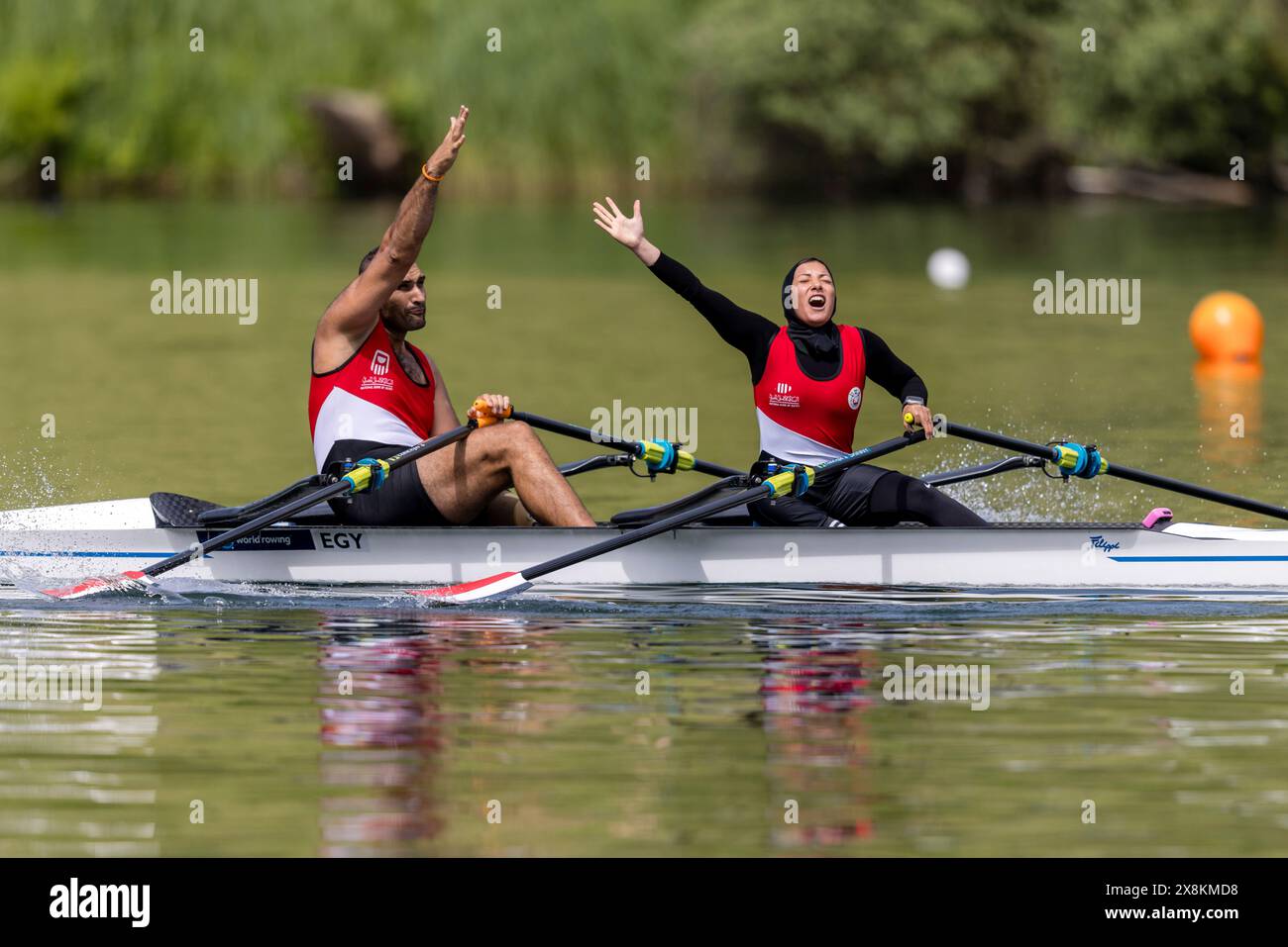 Ali Elzieny, left, and Marwa Abdelall of Egypt celebrate the third ...