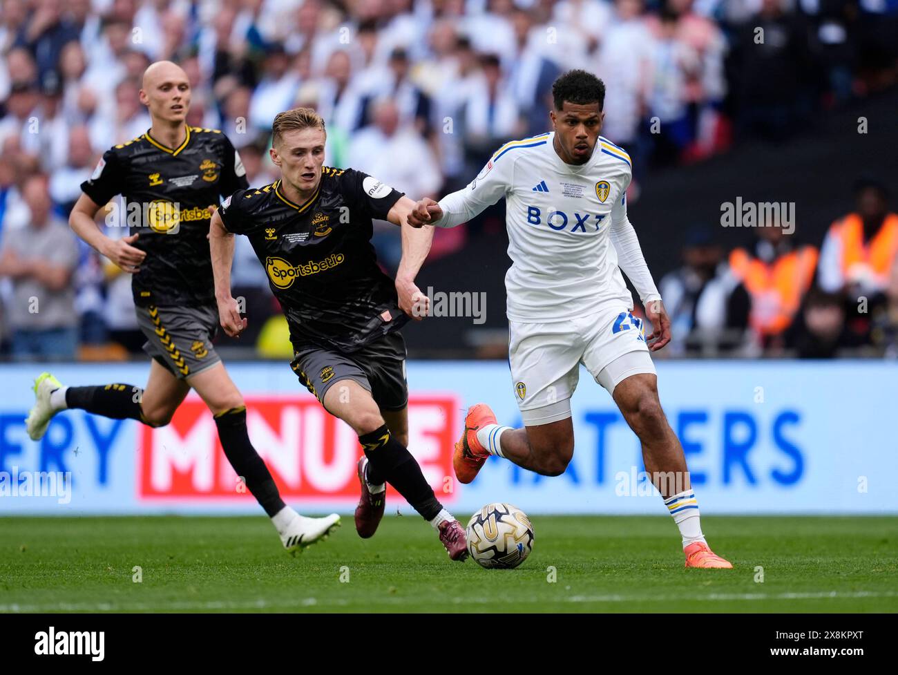Leeds United's Georginio Rutter (right) is chased by Southampton's ...