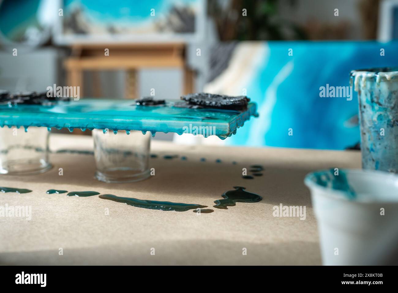 Finished painting dries after being poured with epoxy resin closeup ...