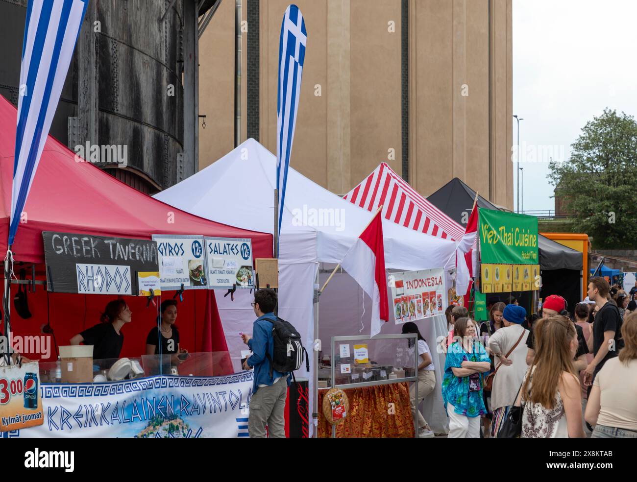 Food booths at the World Village Festival in May 2024. In the ...
