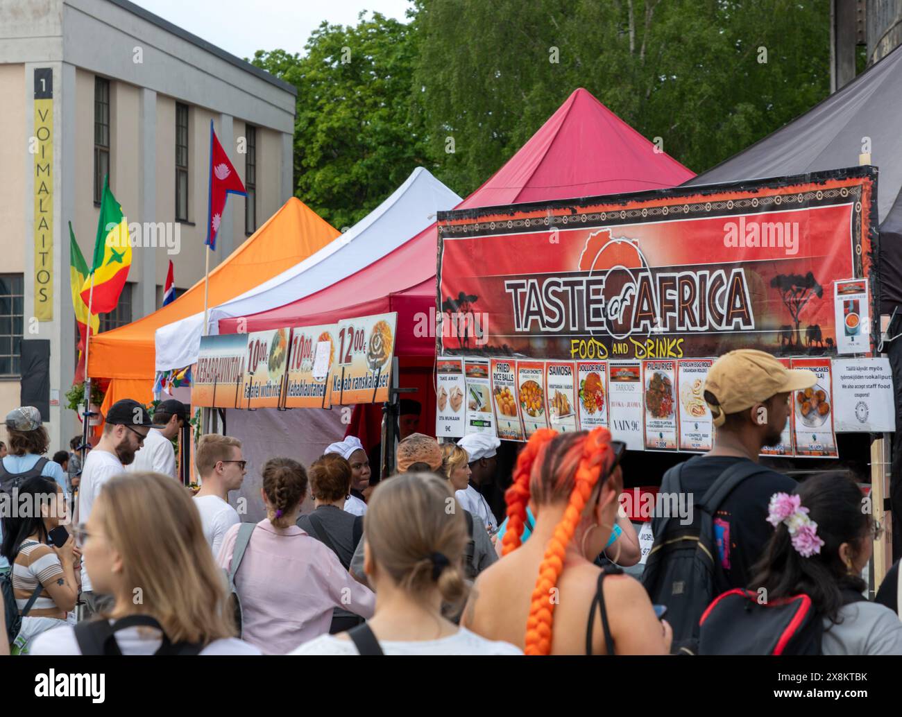 Food booths at the World Village Festival in May 2024. In the ...