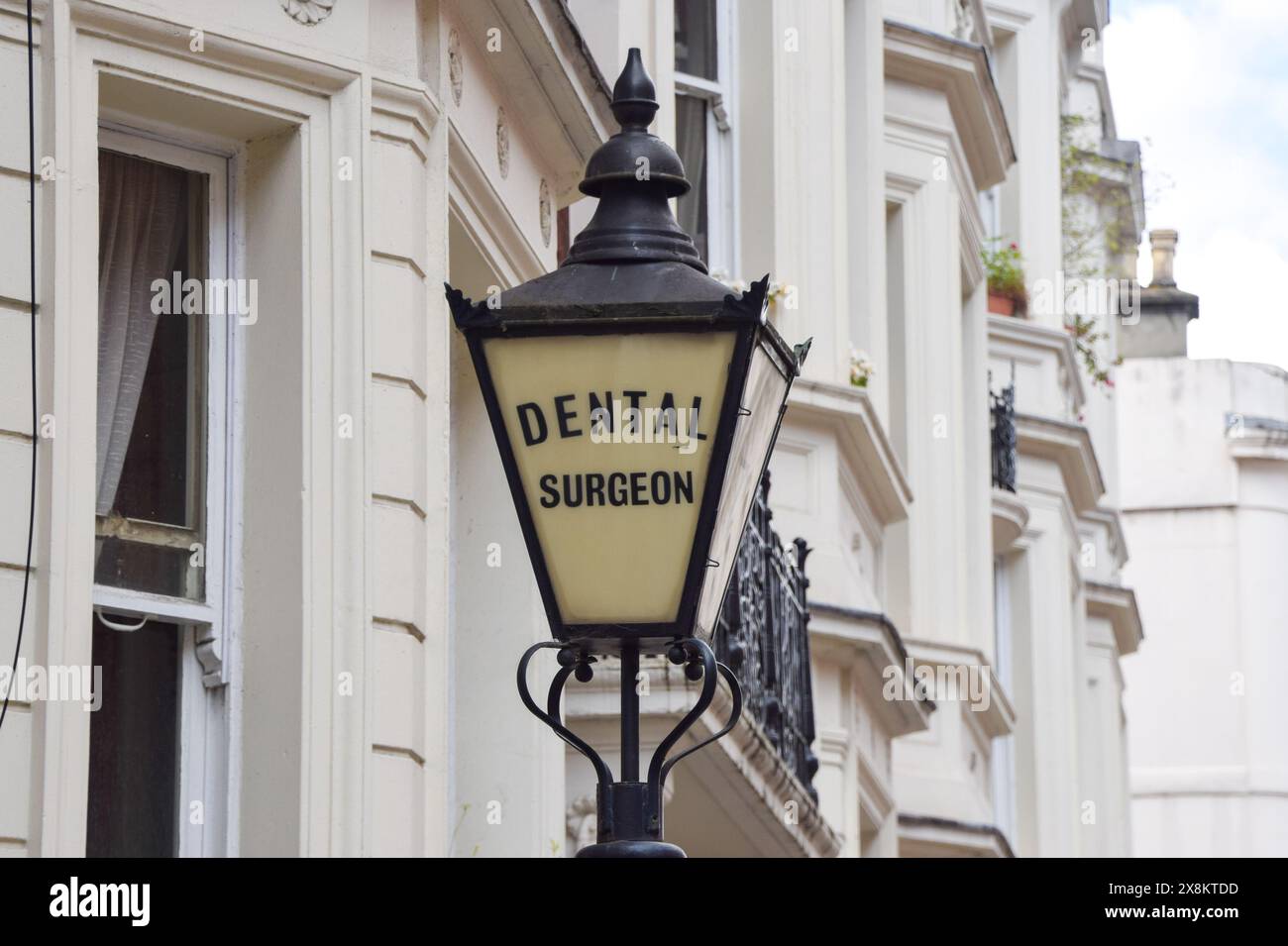 London, UK. 24th May 2024. Dental surgeon sign in central London ...
