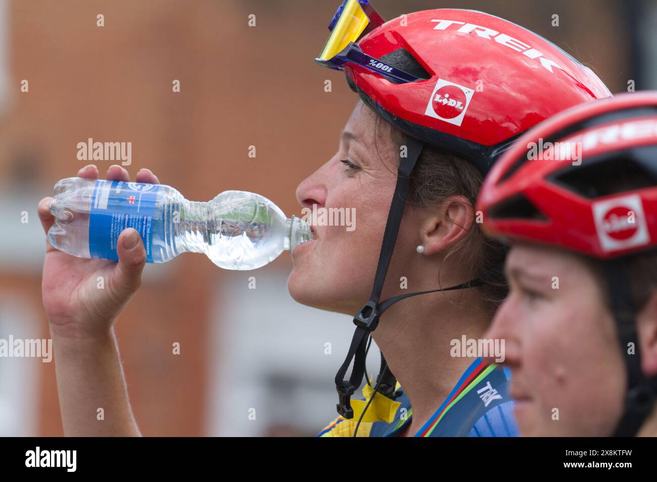 Elizabeth Deignan from Team Lidl-Trek takes a drink of water after ...