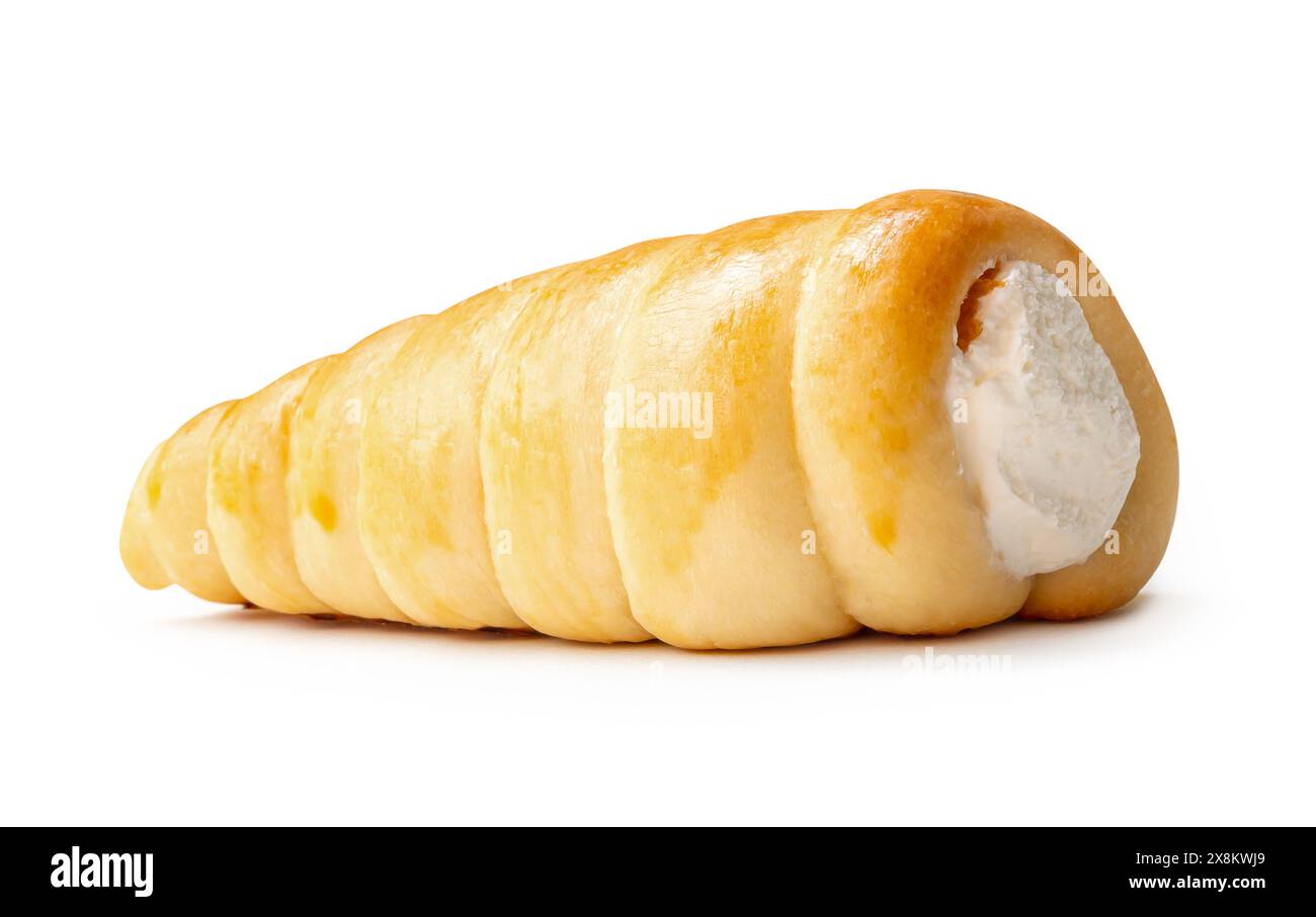 Side view of puff pastry cream horn is isolated on white background ...
