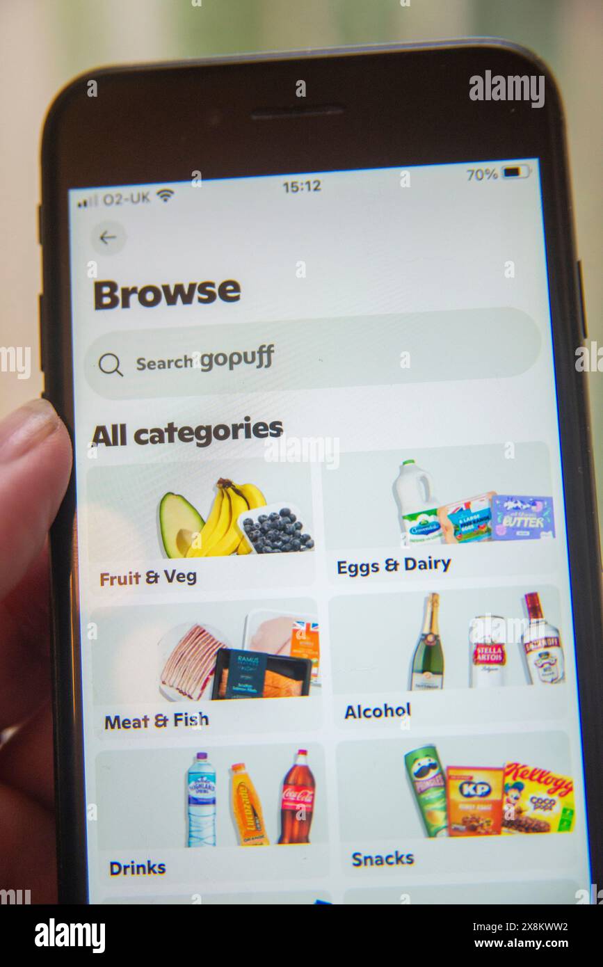 Smartphone displaying the GoPuff app with categories for grocery ...