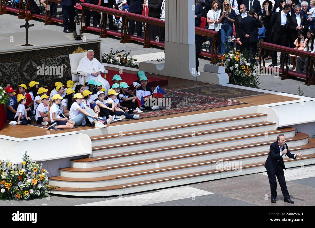 Pope Francis (left) listens to a speech by Italian film director ...