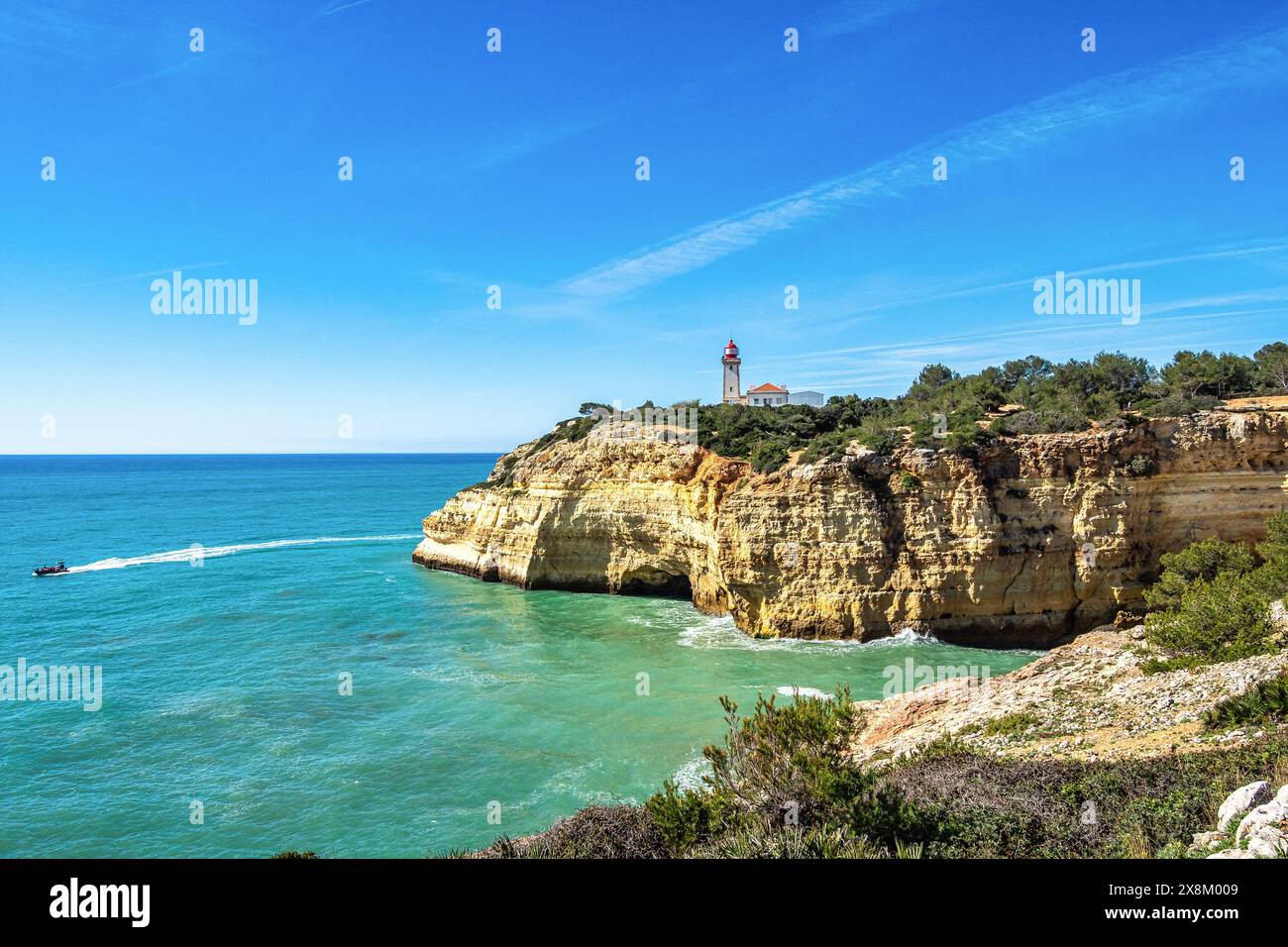 Portuguese coast in Benagil, Algarve, Portugal. Farol de Alfanzina ...