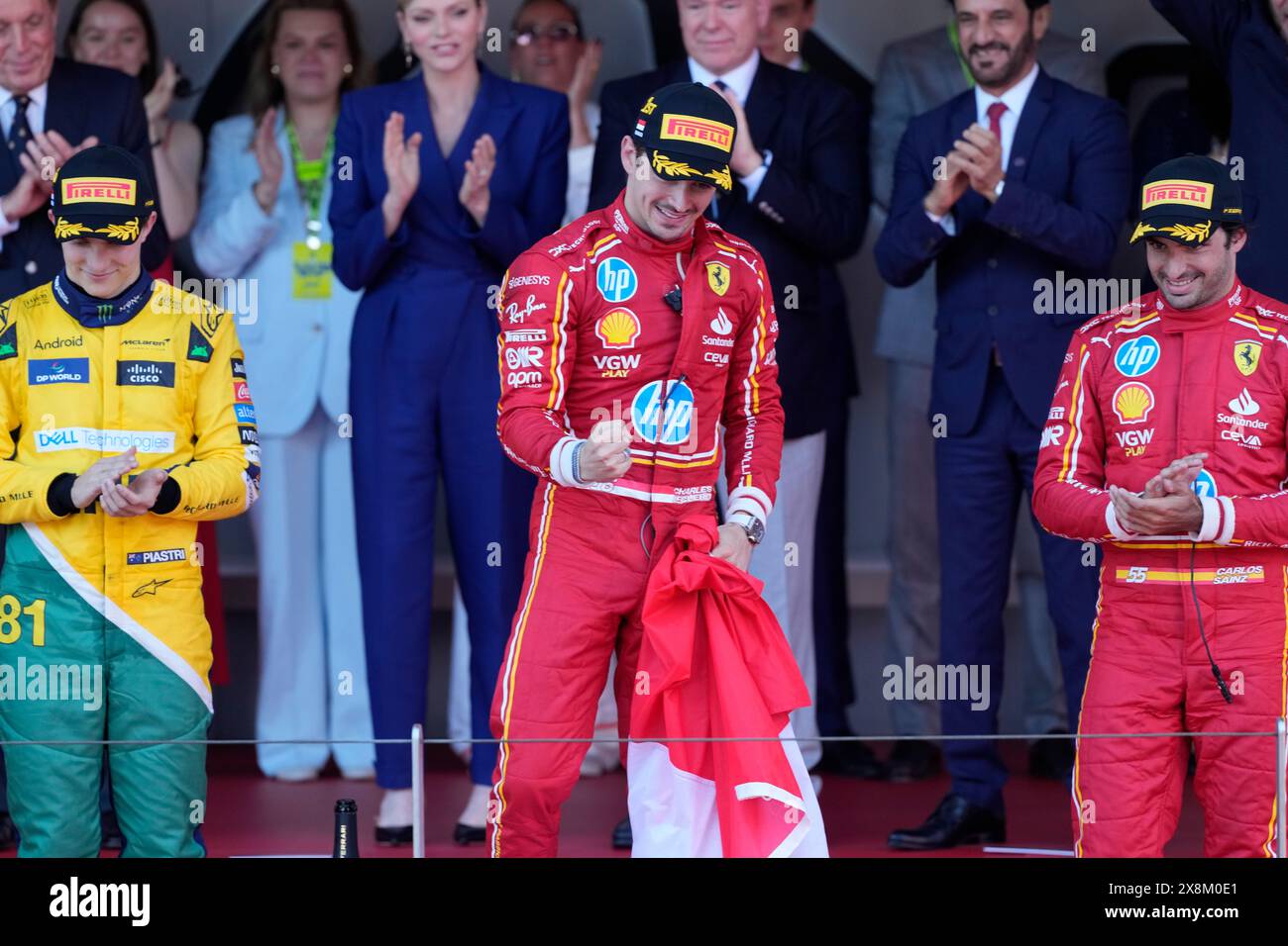 Ferrari driver Charles Leclerc of Monaco, centre, celebrates on the ...