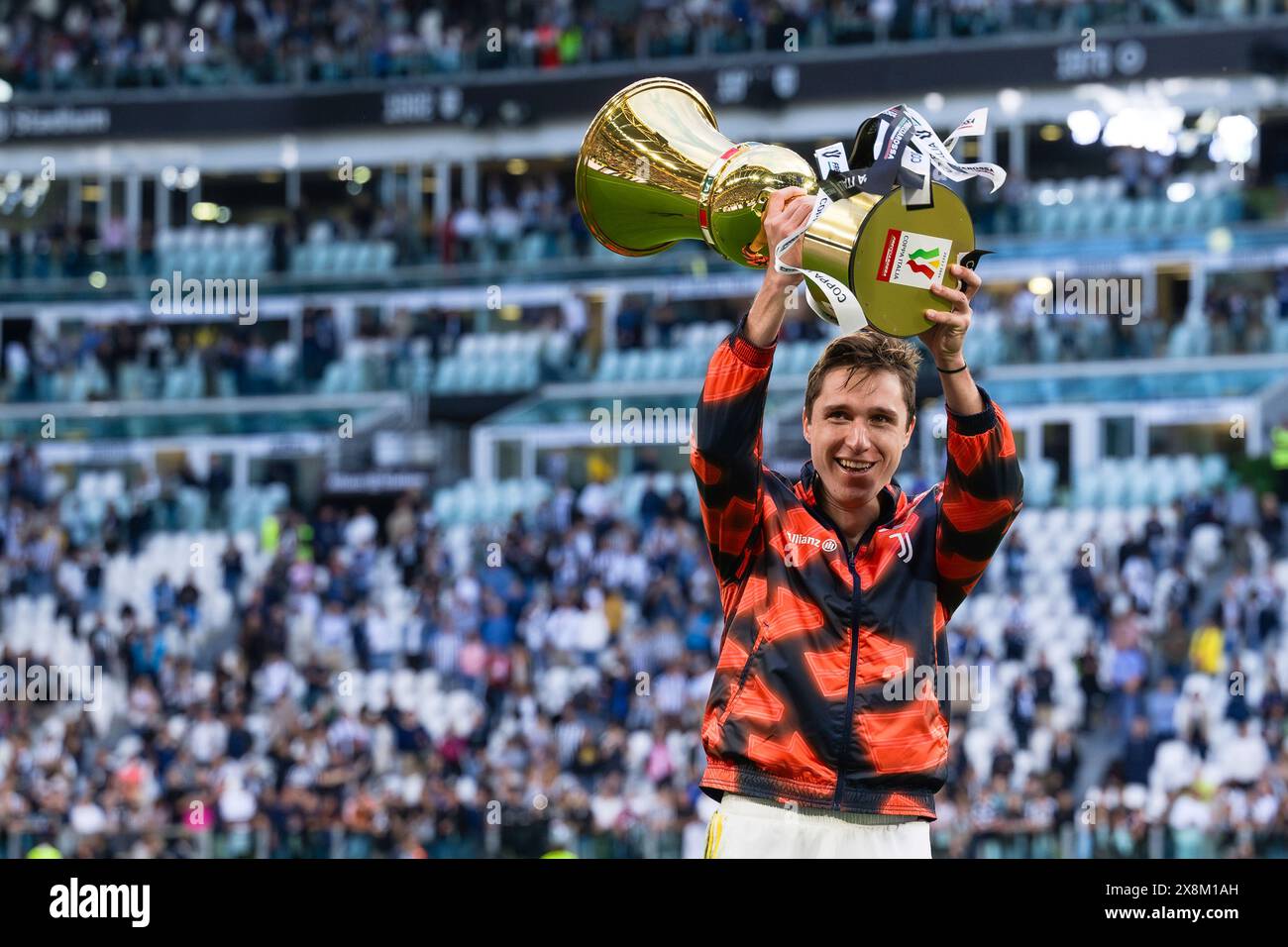 Turin, Italy. 25 May 2024. Federico Chiesa of Juventus FC parades with ...