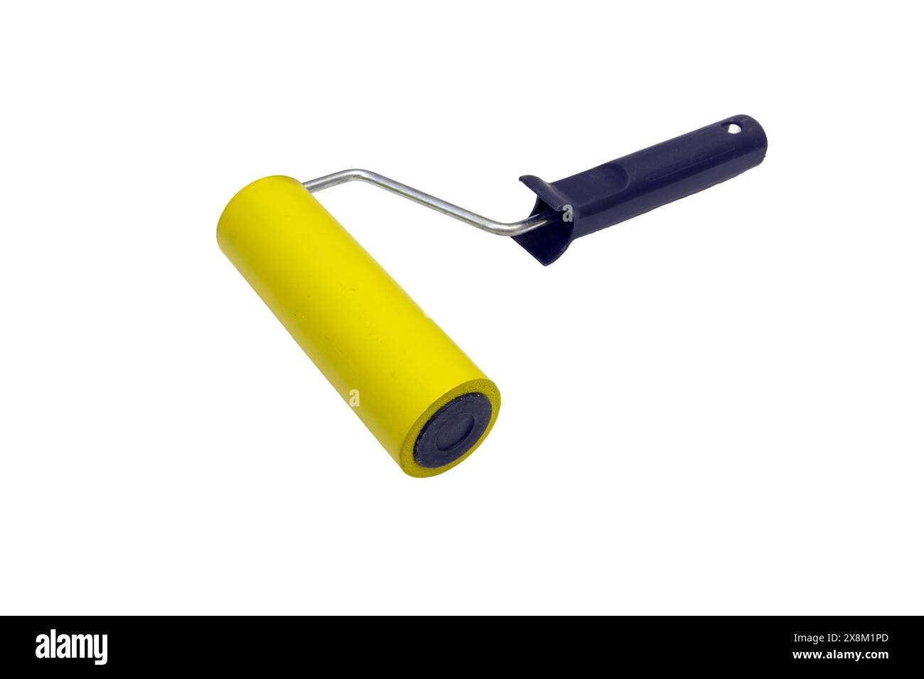 Yellow rubber paint roller on a white background Stock Photo - Alamy