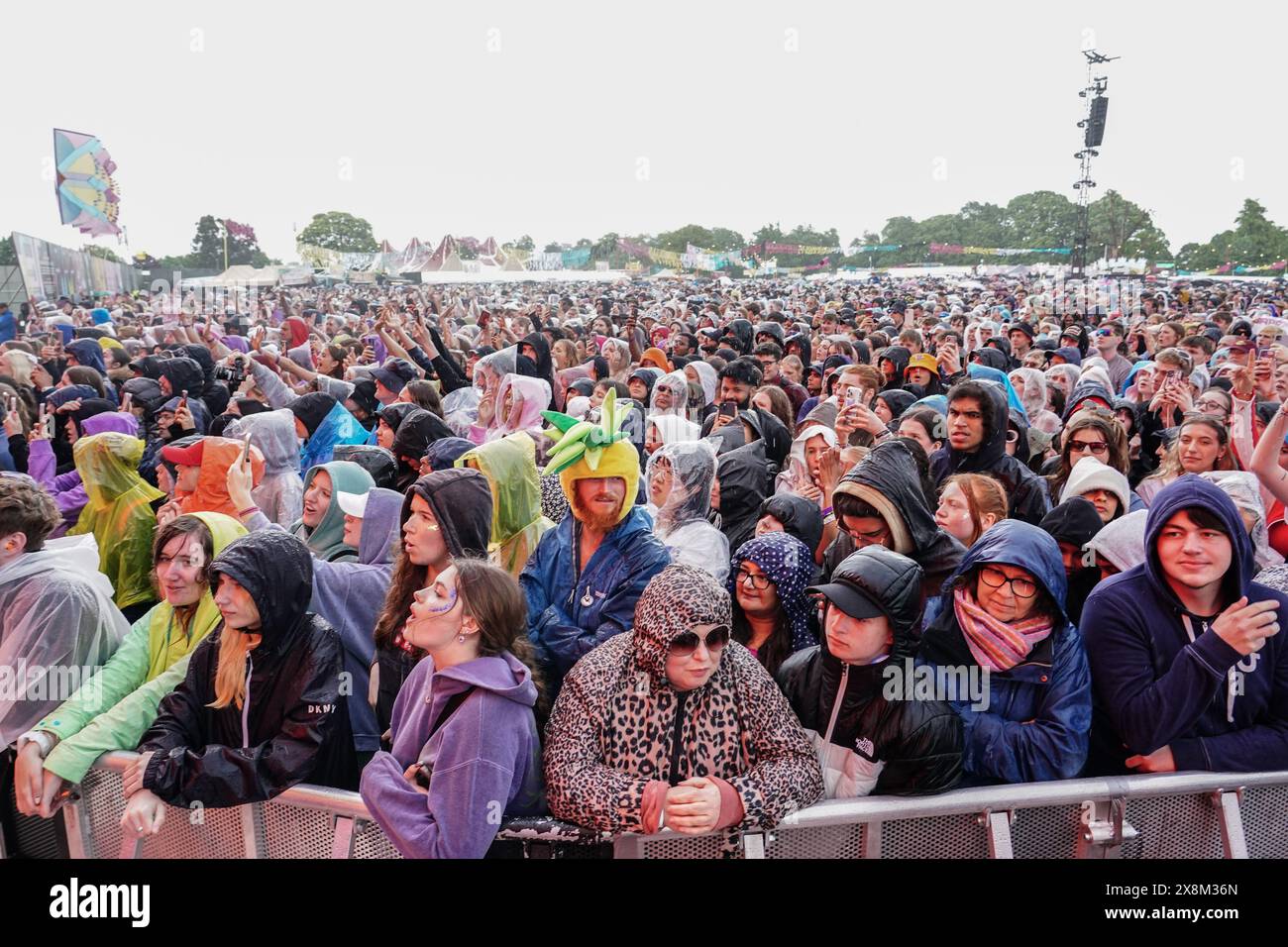 The crowd enduring more rain at the BBC Radio1 Big Weekend at Stockwood ...