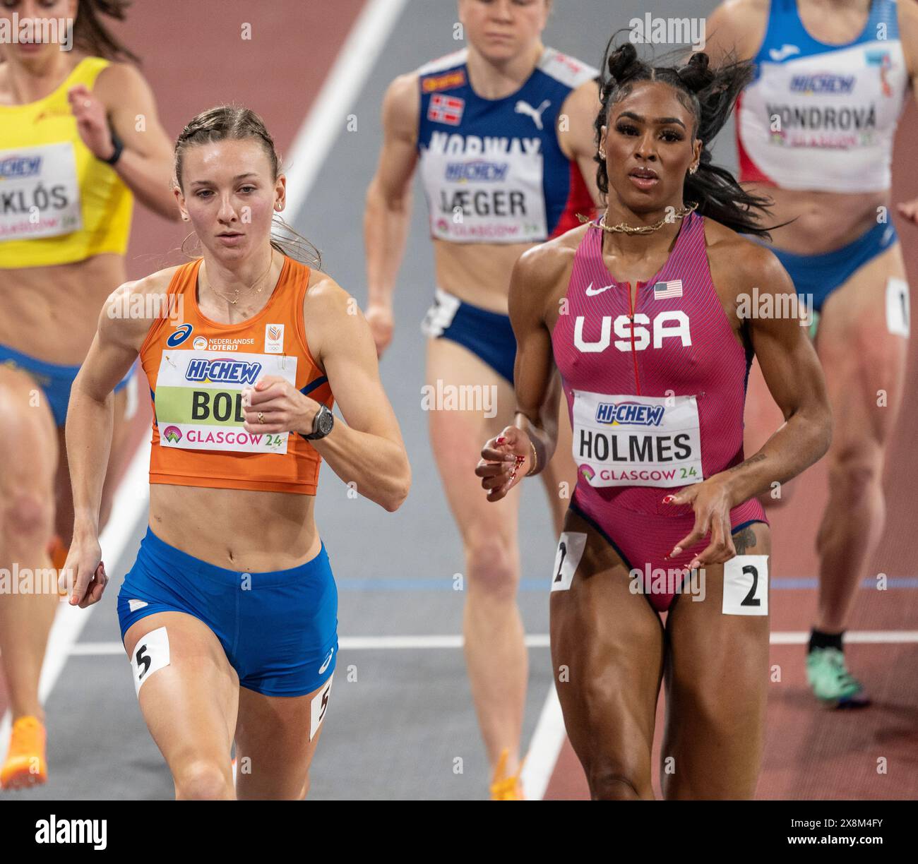 Femke Bol of the Netherlands and Alexis Holmes of the USA competing in ...
