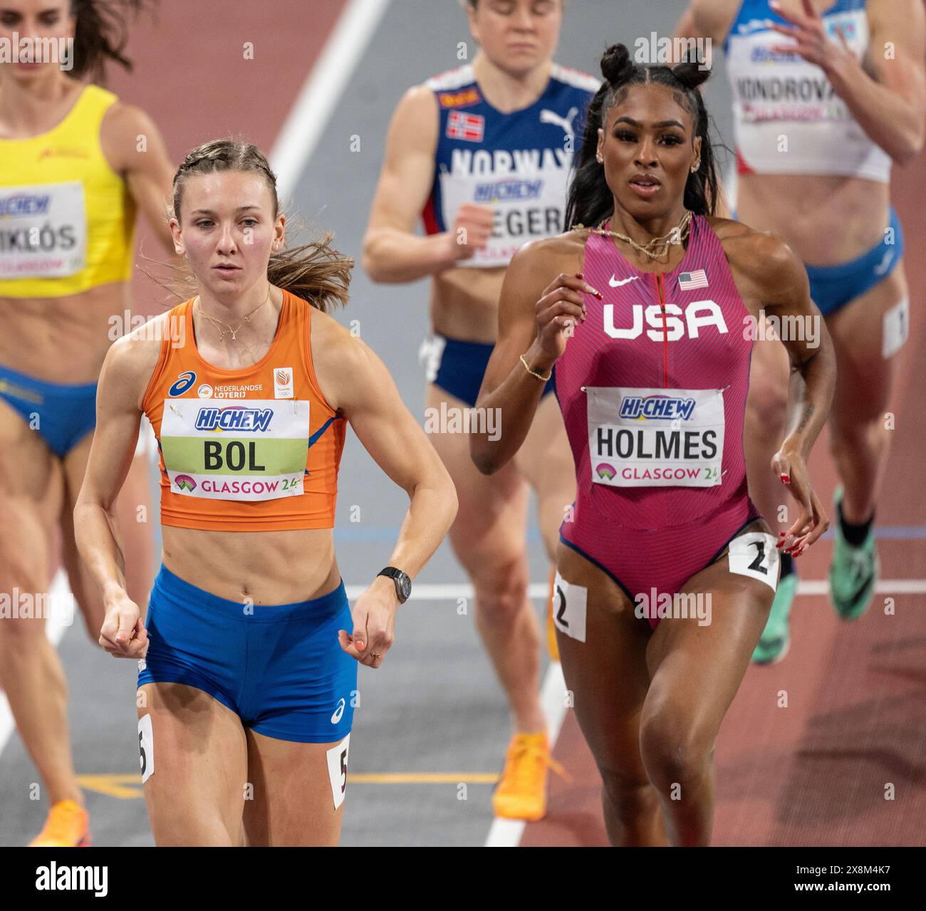 Femke Bol of the Netherlands and Alexis Holmes of the USA competing in ...