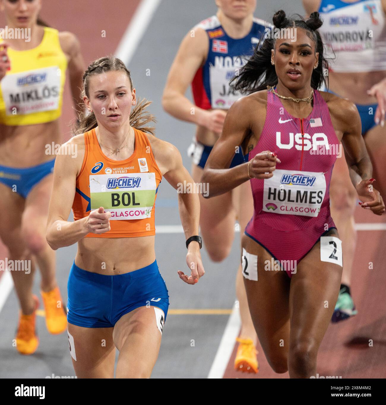 Femke Bol of the Netherlands and Alexis Holmes of the USA competing in ...