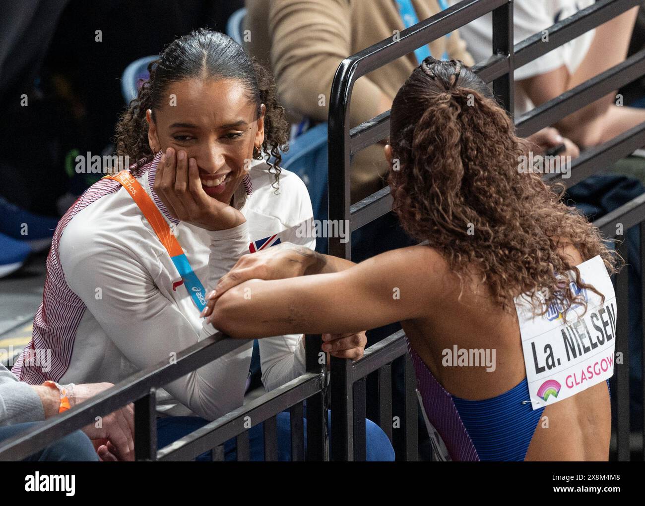 Laviai Nielsen of Great Britain talking to her twin sister Lina Nielsen ...