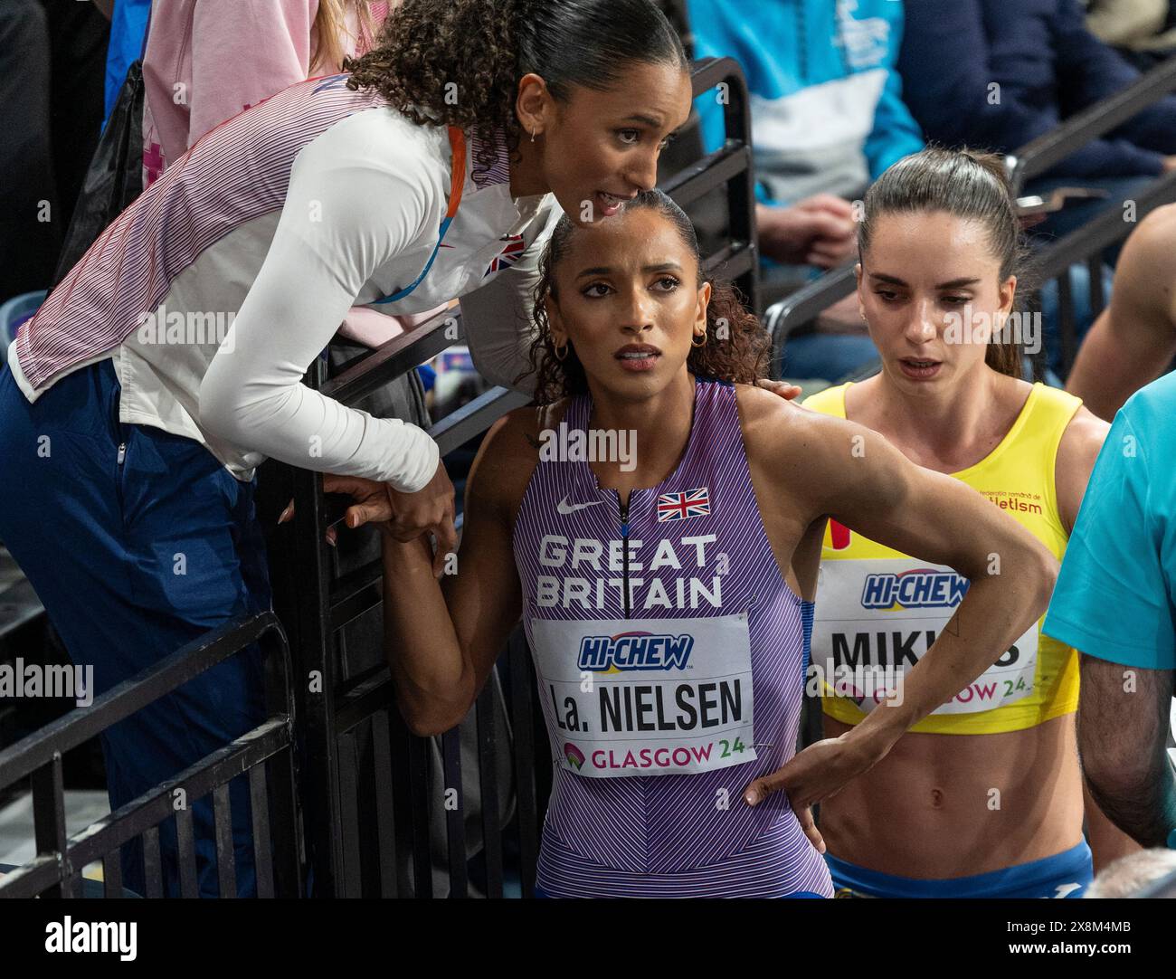 Laviai Nielsen of Great Britain talking to her twin sister Lina Nielsen ...