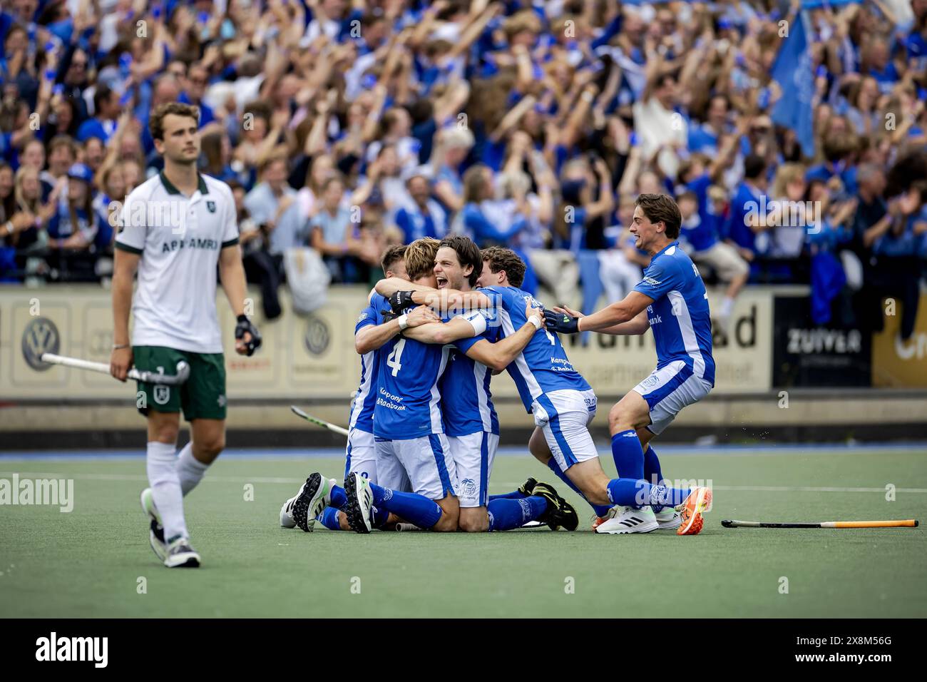 UTRECHT - The players of Kampong celebrate the championship during the ...