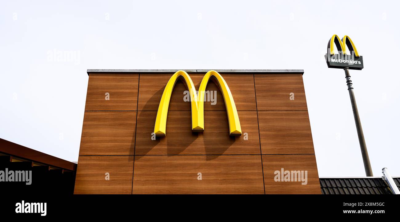 Berlin, Germany - 10 April 2023: big sign and sign board on entrance of ...