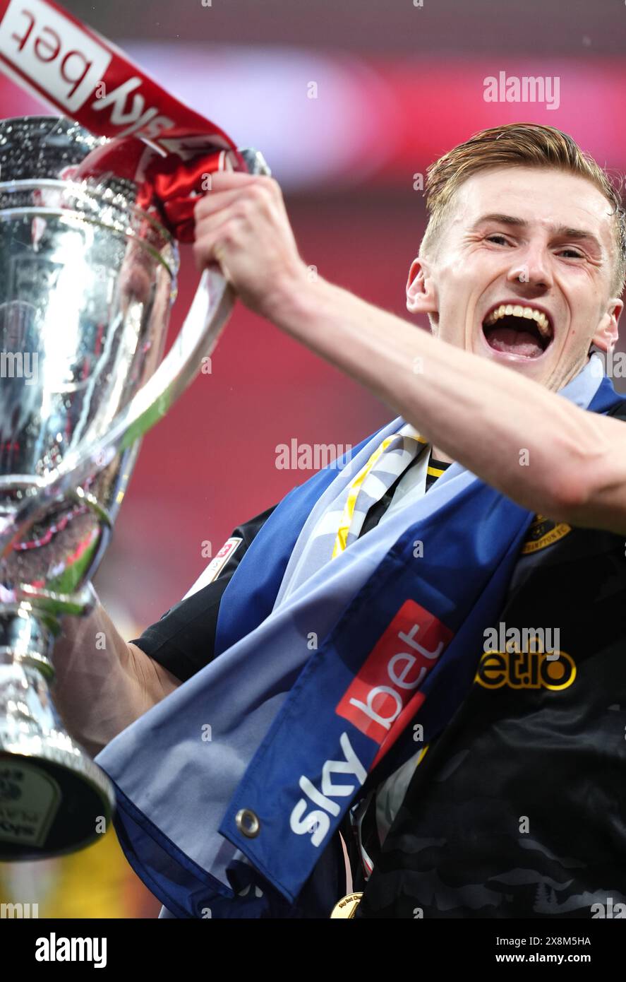 Southampton's Flynn Downes celebrates with the trophy following ...
