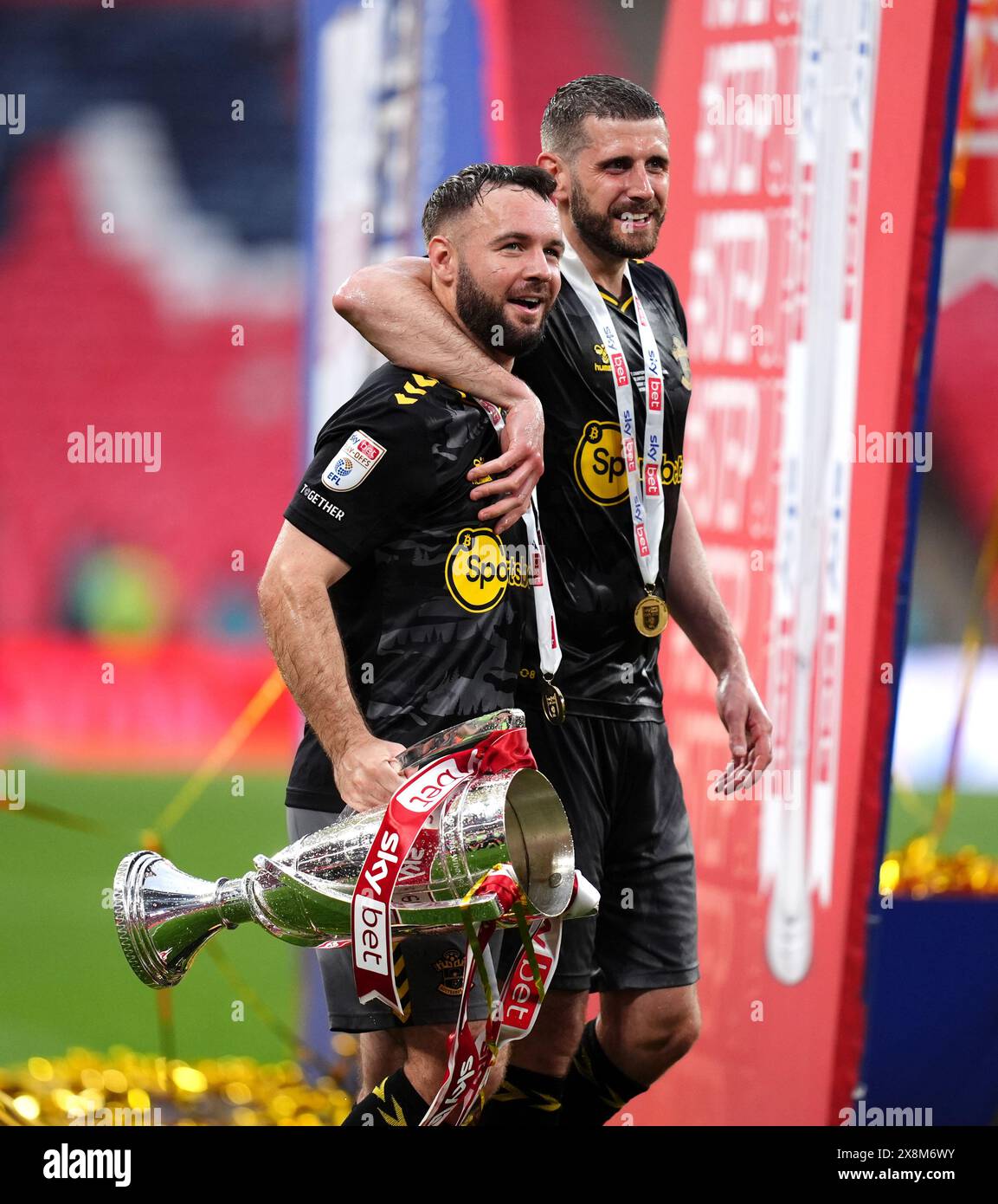 Southampton's Adam Armstrong lifts the trophy after winning the Sky Bet ...
