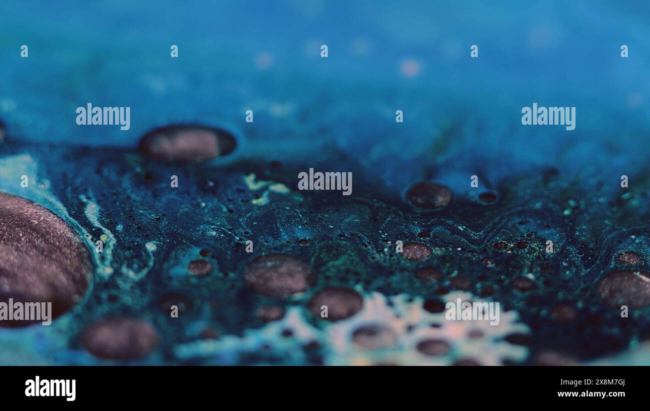 Glitter foam. Ink bubbles. Defocused blue pink black color shimmering ...