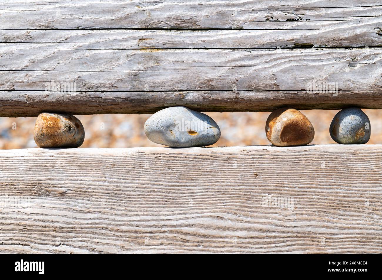 Pebbles stuck in boards hi-res stock photography and images - Alamy
