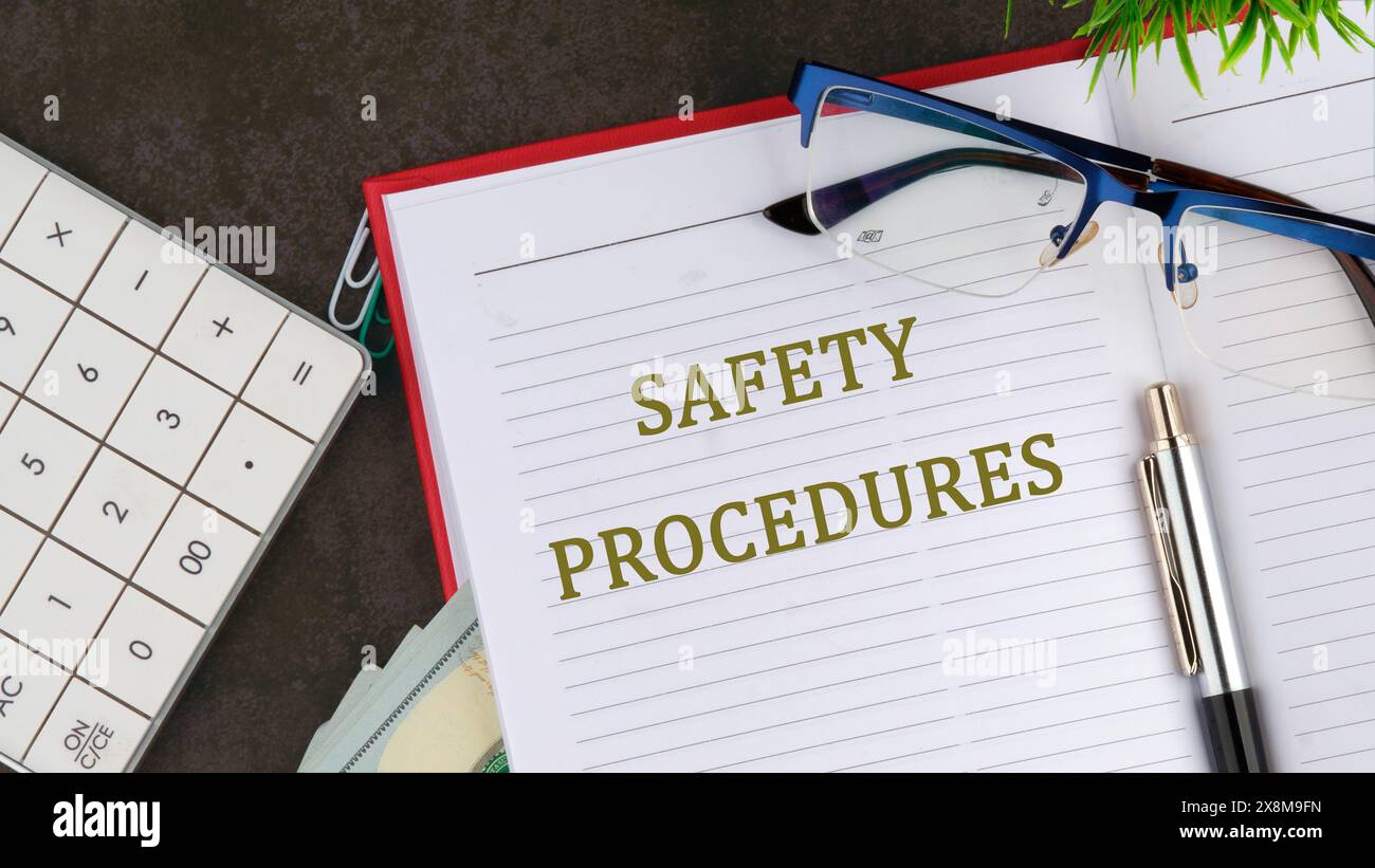 Safety Procedures concept. SAFETY PROCEDURES written on the open page ...