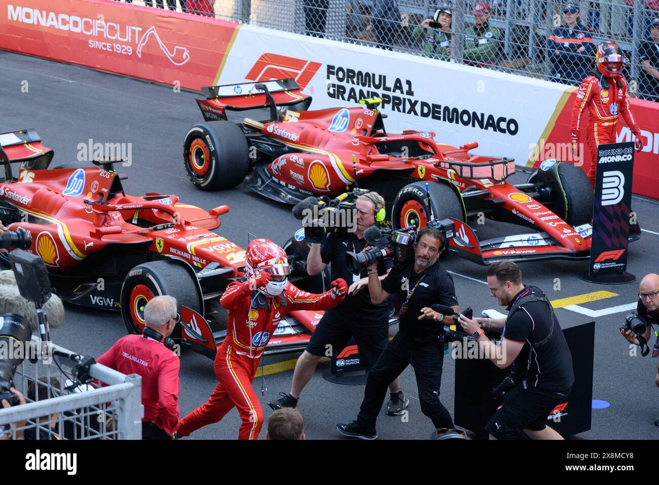 Charles Leclerc of Monaco and Ferrari celebrates his win on the grid ...