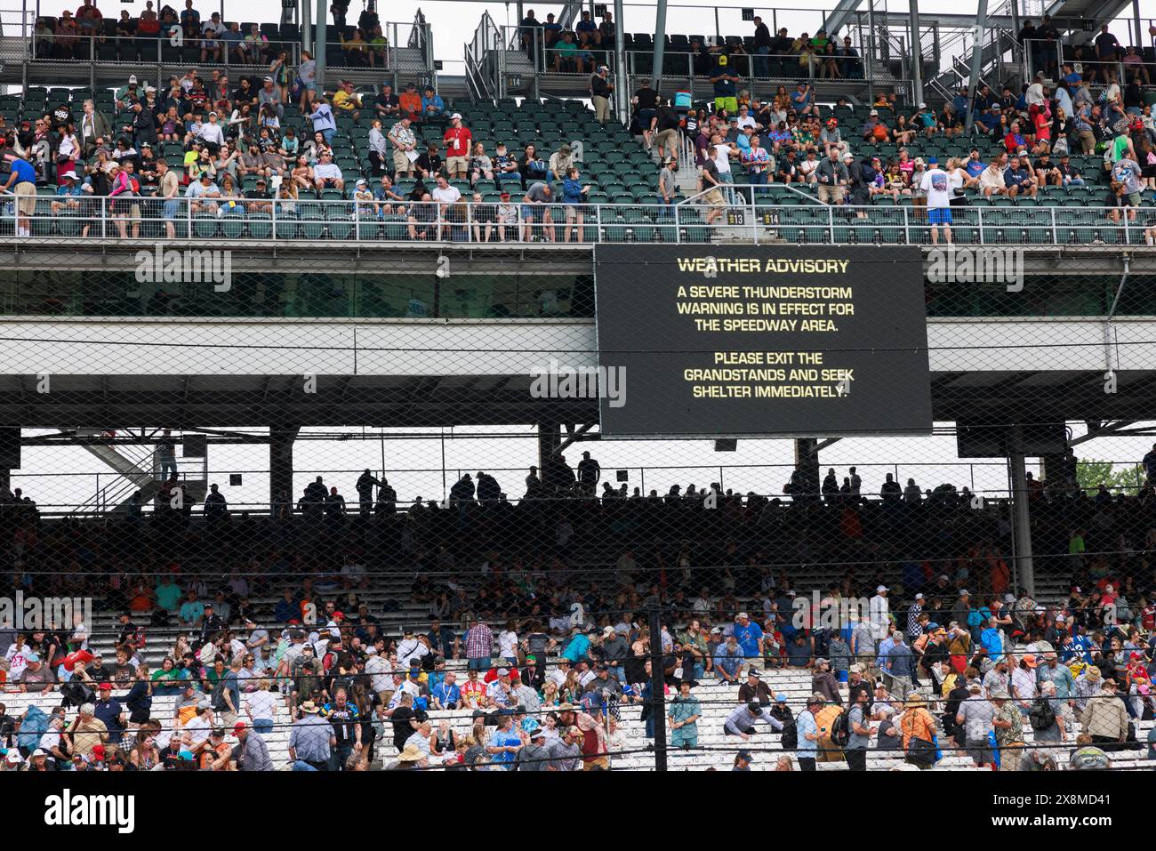 INDIANAPOLIS, INDIANA - MAY 26: Face fans are evacuated from the stands ...