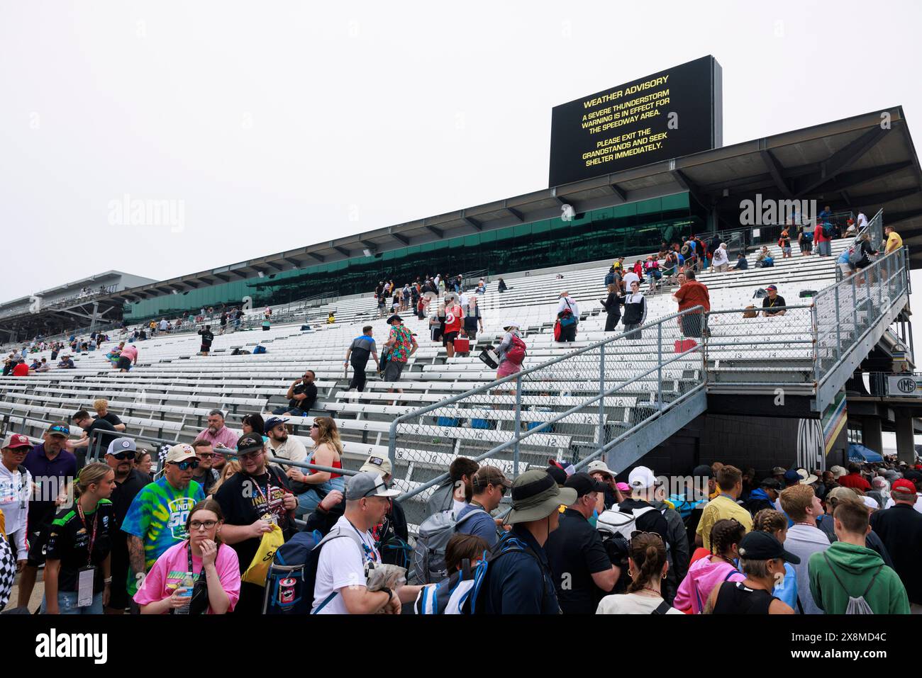 INDIANAPOLIS, INDIANA - MAY 26: Face fans are evacuated from the stands ...