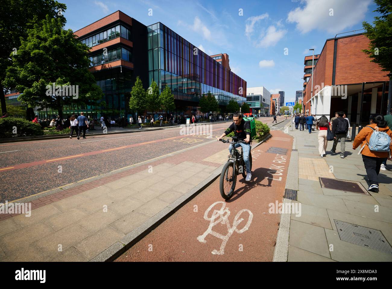 Manchester Oxford Road corridor with a dedicated cycle lane and new ...