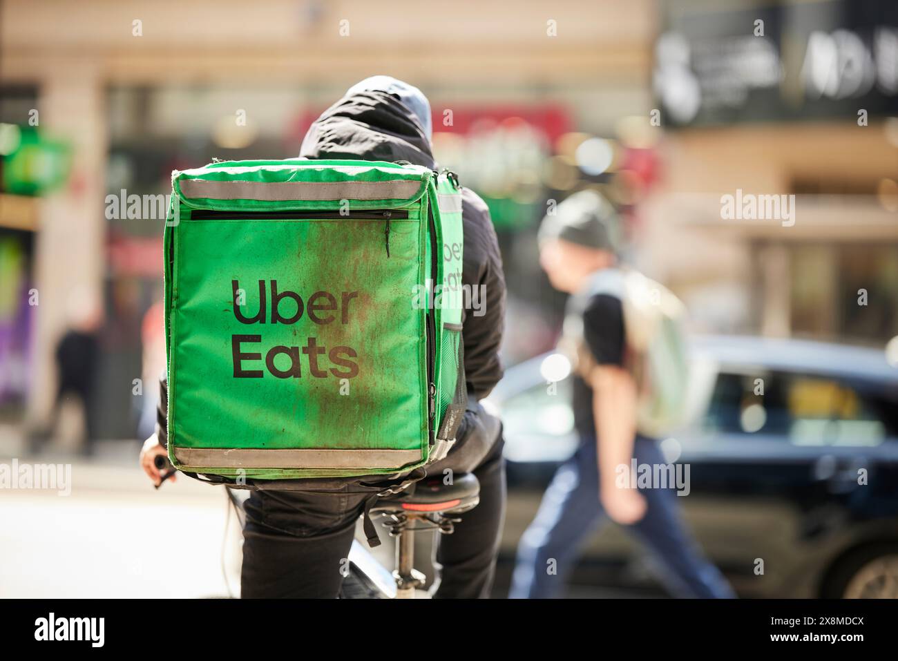 Manchester Oxford Road corridor Uber Eats delivery cyclist Stock Photo ...