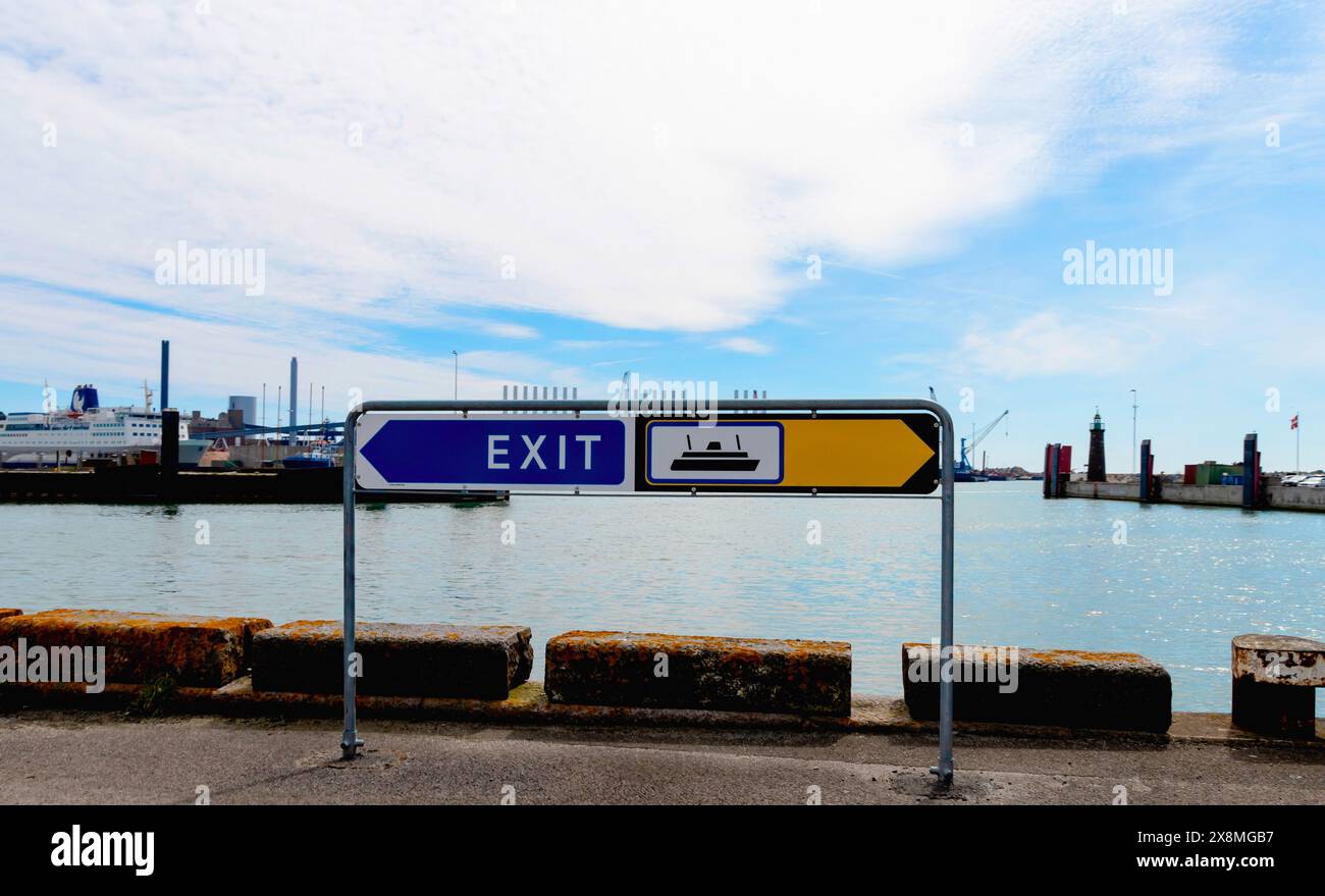 Exit sign in English and ferry entry Stock Photo - Alamy
