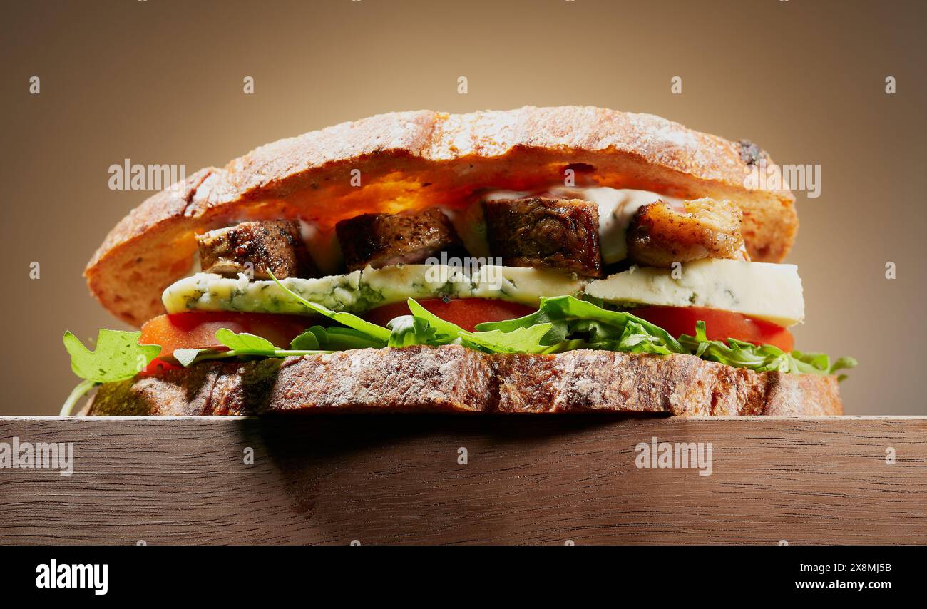 Stacked beef sandwich made with sourdough bread Stock Photo - Alamy