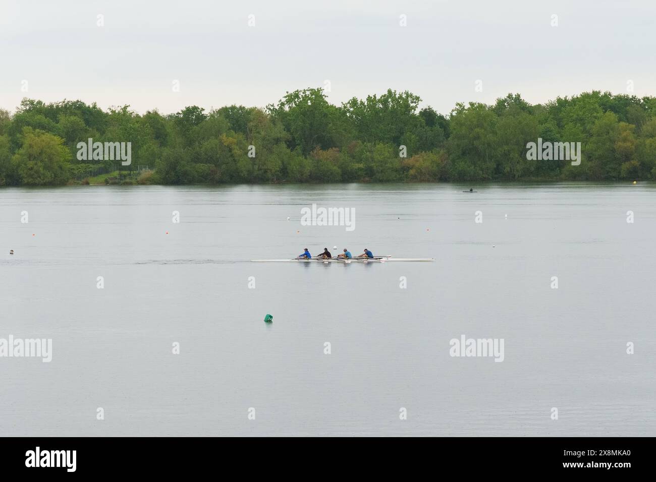 Bordeaux, France - April 26, 2023: A group of people rowing a boat on a ...