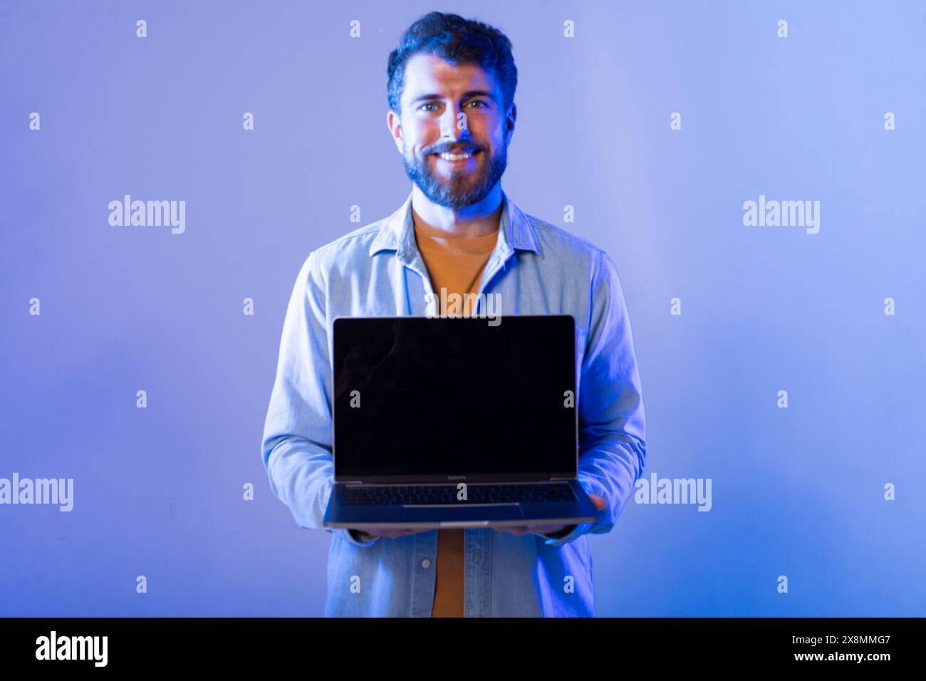 Yellow neon display man presenting hi-res stock photography and images ...