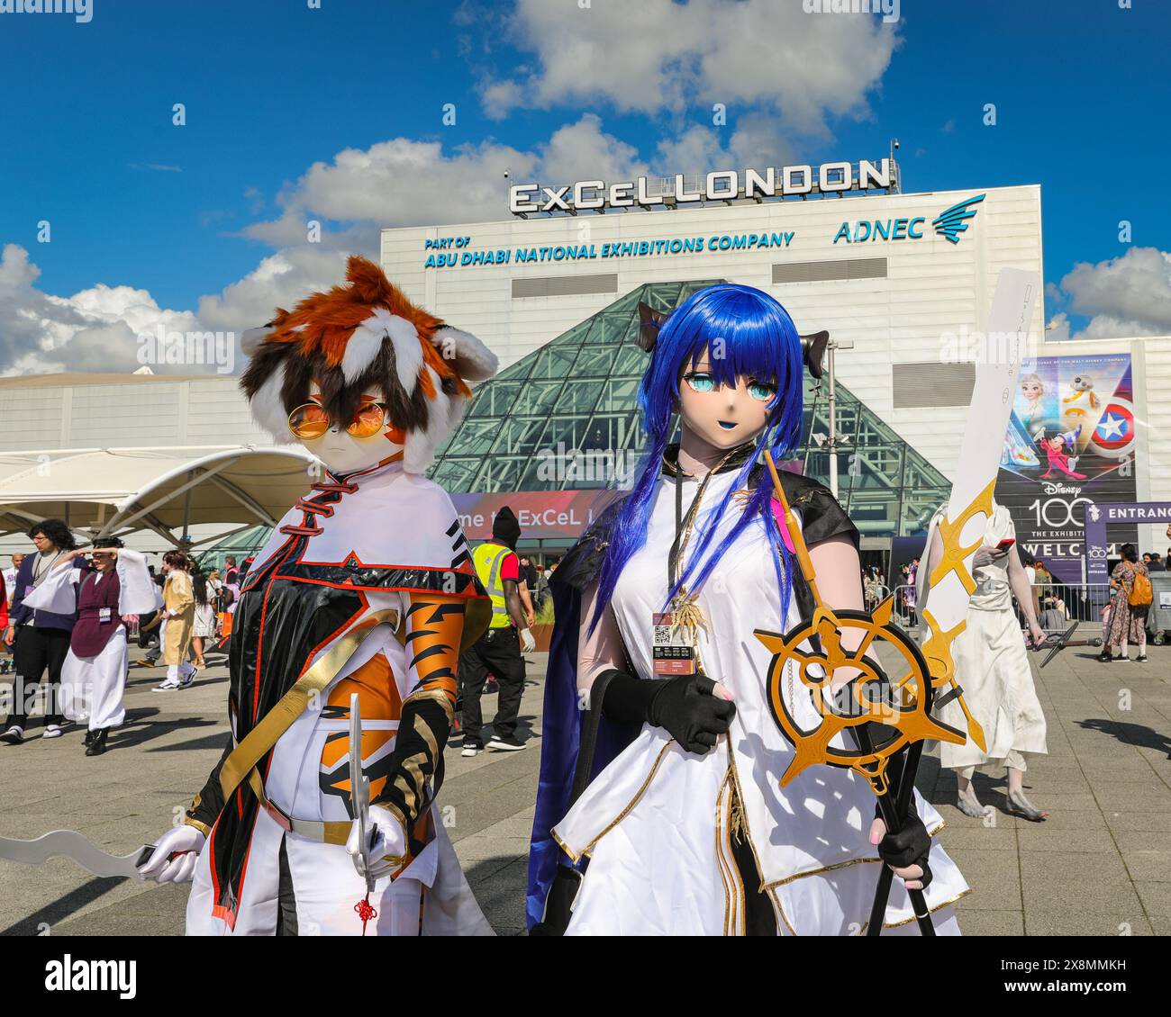 London, UK. 26th May, 2024. Two cosplayers in outfits from the 'Fate ...