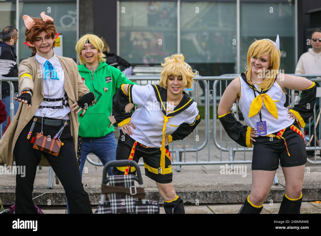 London, UK. 26th May, 2024. Cosplayers join for a spontaneous Macarena ...