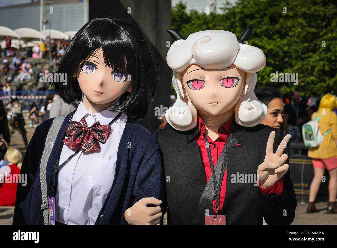 London, UK. 26th May, 2024. Two participants in anime character outfits ...