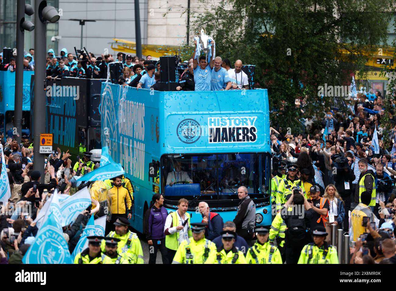 Manchester City's Rodri lifts the Premier League trophy during a trophy ...