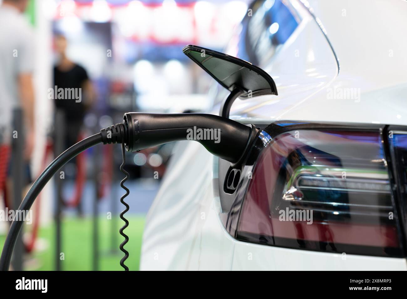Cable plug and socket of an electric vehicle hi-res stock photography ...