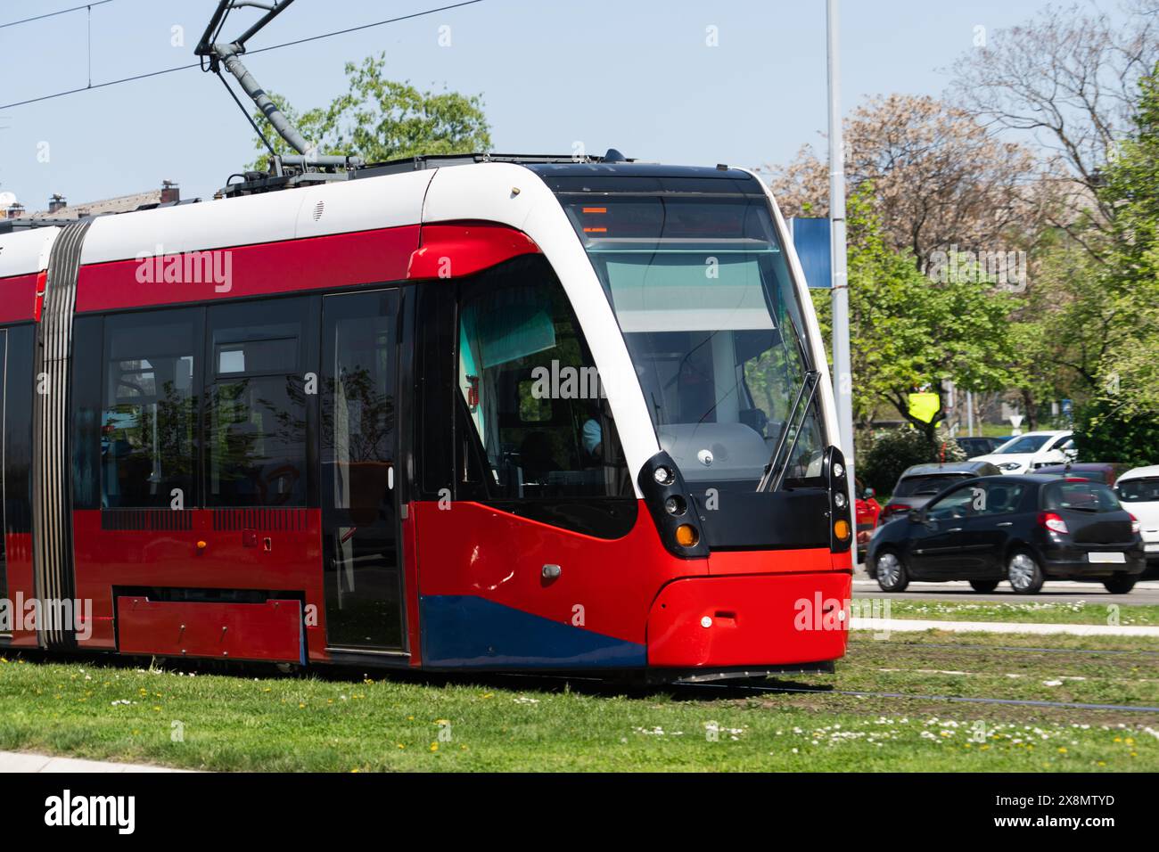 City traffic on street tramway hi-res stock photography and images - Alamy