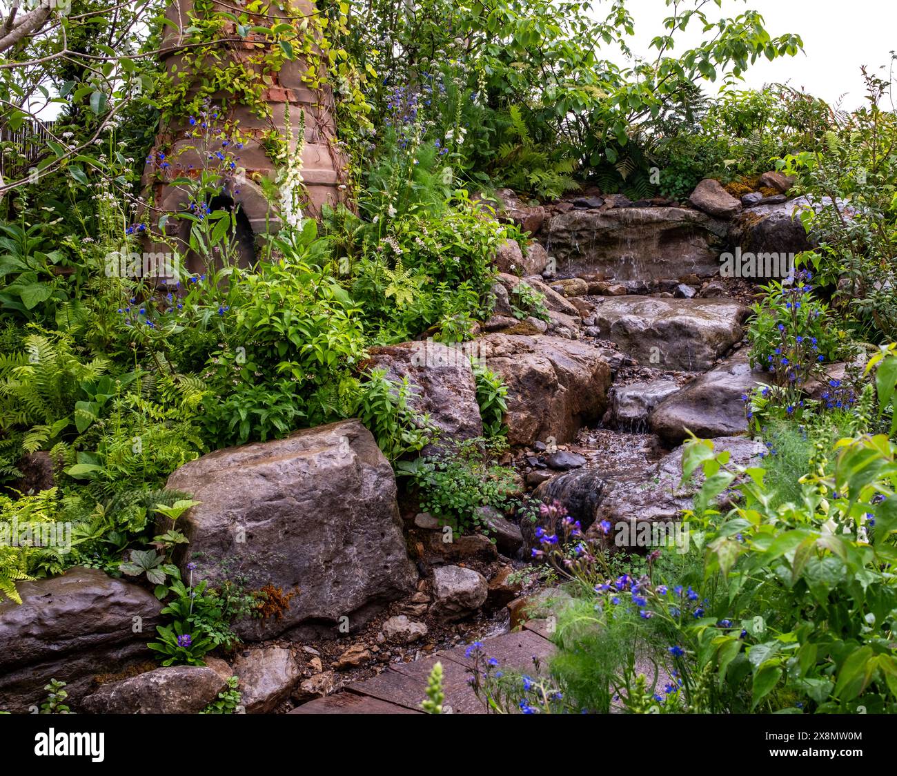 Waterfall and rockery in a pretty display garden at the 2024 RHS ...