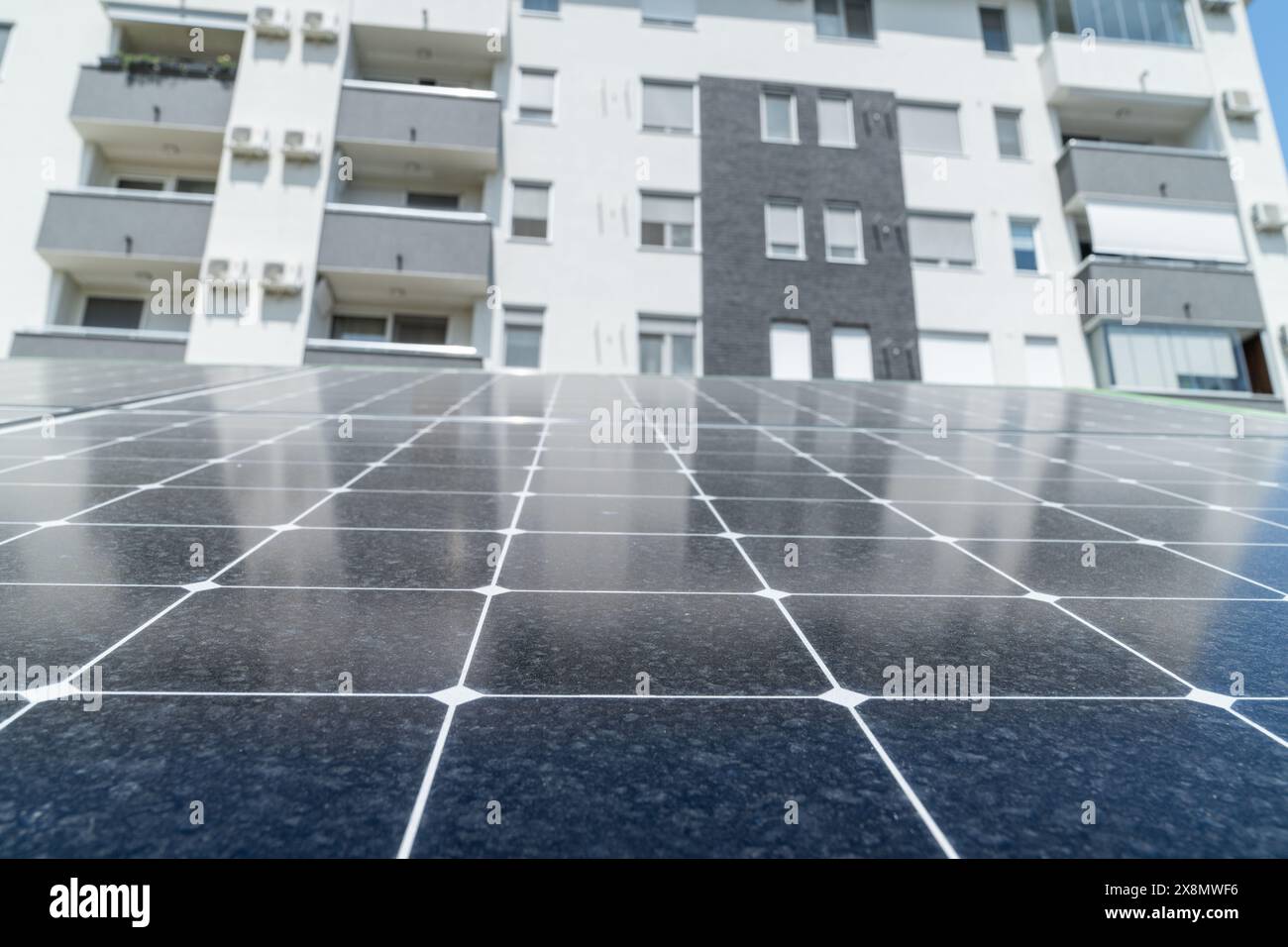 Solar panels near an apartment building Stock Photo - Alamy