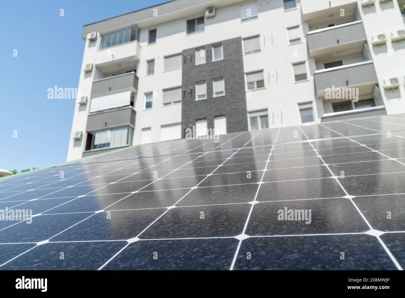Solar panels near an apartment building Stock Photo - Alamy