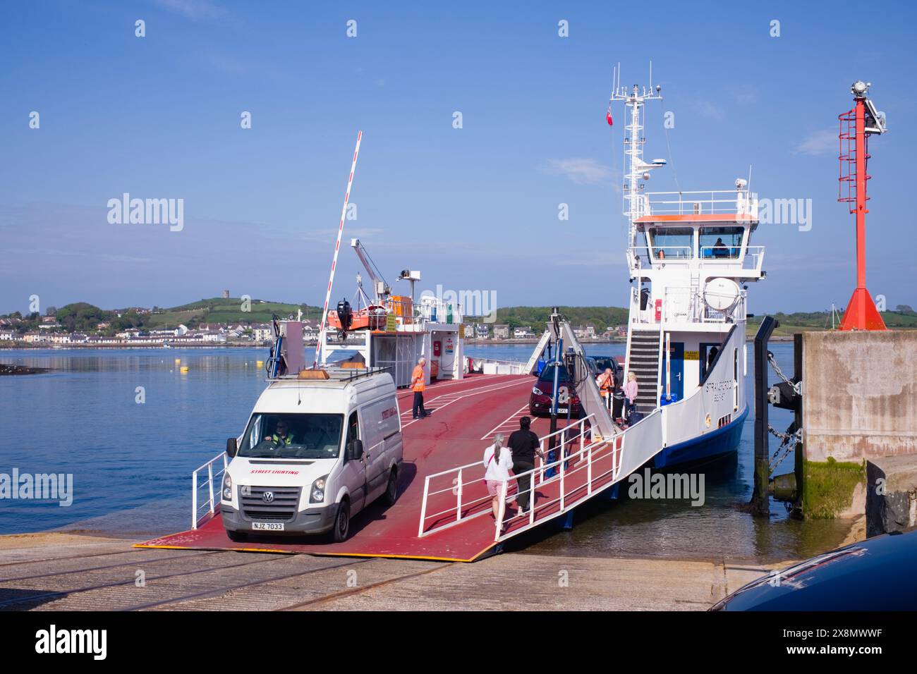 Vehicles leaving the Strangford ferry at Strangford with Portaferry in ...