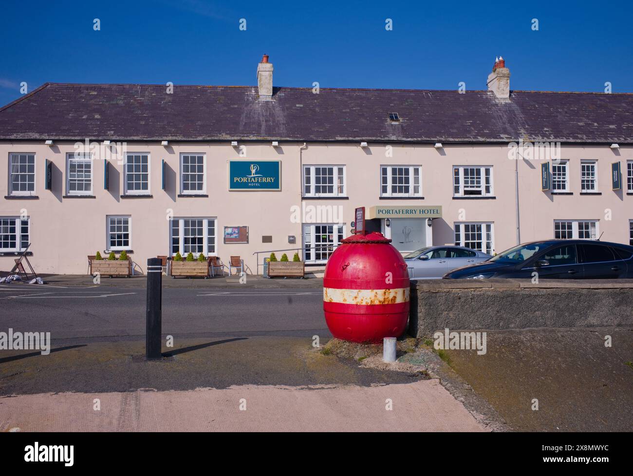 Portaferry Hotel with sea mine in the foreground Stock Photo - Alamy